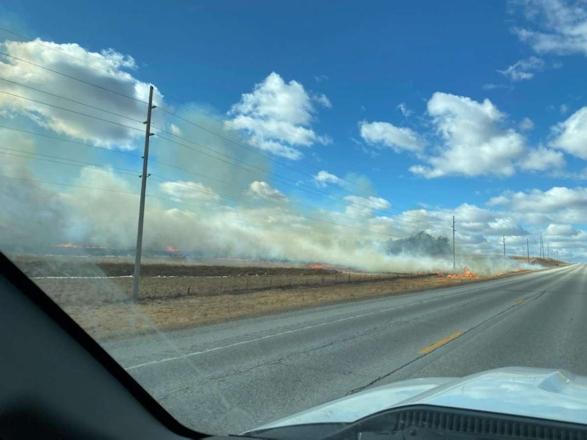 3 fire departments battle the wind & field fire flames Wed. afternoon ...